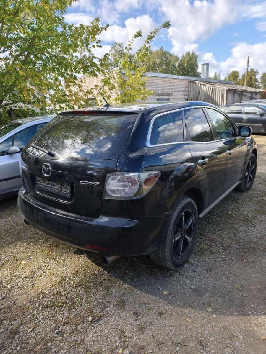 Black Mazda CX-7 2008 in Panevezys, with an engine capacity of 2.30 L and mileage of 210 thousand km for 950 €, photo 4 on AUTOMOTO.COM.LV