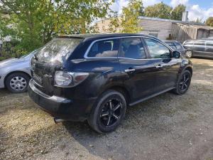Black Mazda CX-7 2008 in Panevezys, with an engine capacity of 2.30 L and mileage of 210 thousand km for 950 €, photo 5 on AUTOMOTO.COM.LV