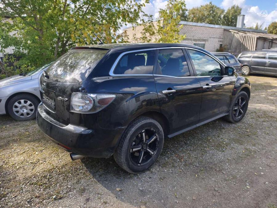 Black Mazda CX-7 2008 in Panevezys, with an engine capacity of 2.30 L and mileage of 210 thousand km for 950 €, photo 5 on AUTOMOTO.COM.LV