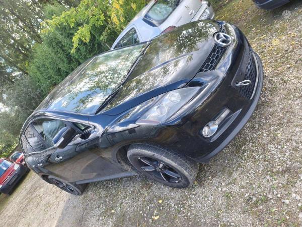 Melns Mazda CX-7 2008 Panevēža, ar dzinēja tilpumu 2.30 L un nobraukumu 210 tūkst. km par 950 €, foto 6 vietnē AUTOMOTO.COM.LV