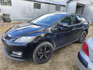 Black Mazda CX-7 2008 in Panevezys, with an engine capacity of 2.30 L and mileage of 210 thousand km for 950 €, photo 9 on AUTOMOTO.COM.LV
