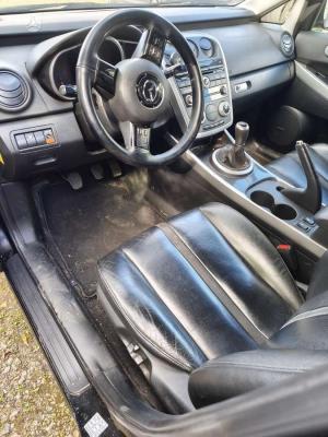 Black Mazda CX-7 2008 in Panevezys, with an engine capacity of 2.30 L and mileage of 210 thousand km for 950 €, photo 12 on AUTOMOTO.COM.LV