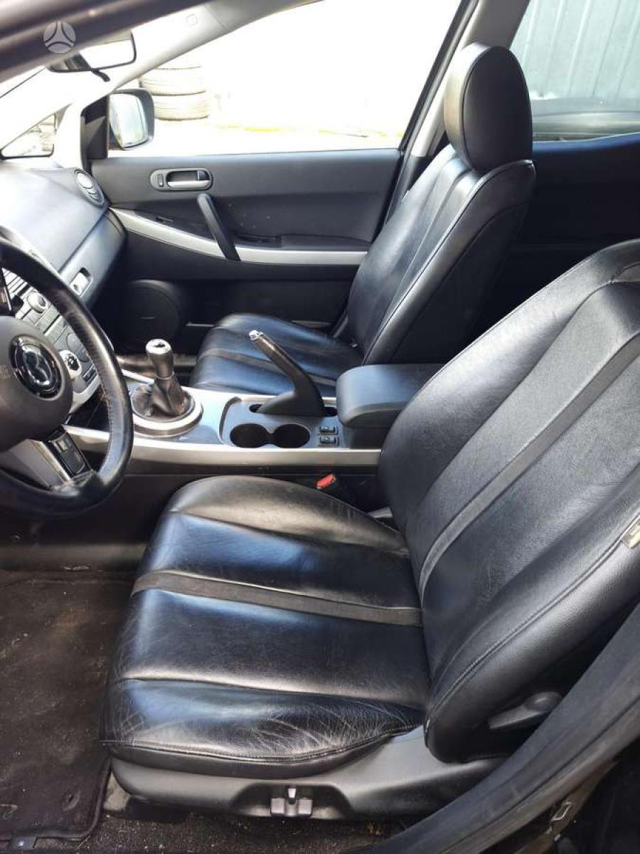 Black Mazda CX-7 2008 in Panevezys, with an engine capacity of 2.30 L and mileage of 210 thousand km for 950 €, photo 13 on AUTOMOTO.COM.LV