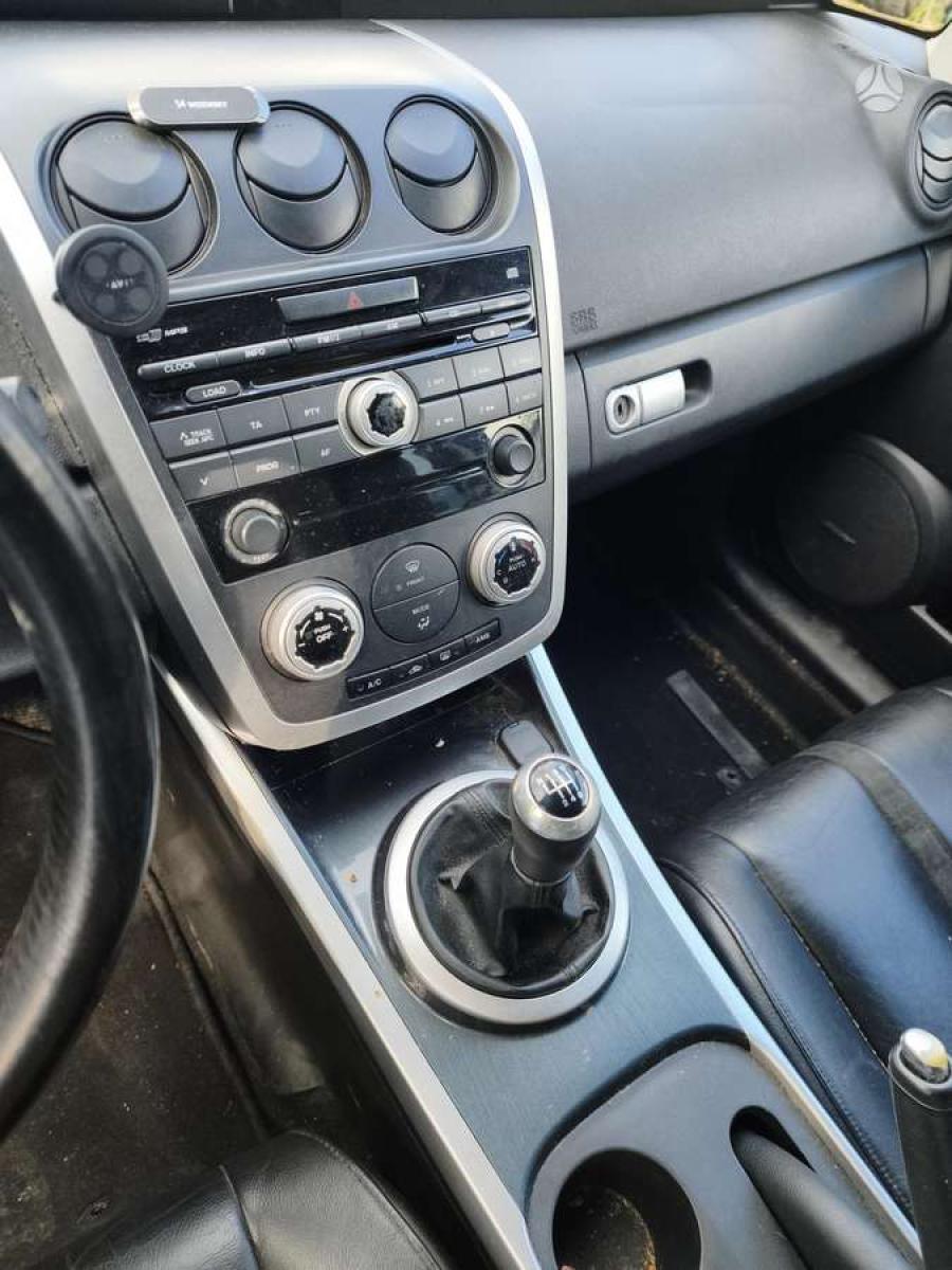 Black Mazda CX-7 2008 in Panevezys, with an engine capacity of 2.30 L and mileage of 210 thousand km for 950 €, photo 14 on AUTOMOTO.COM.LV