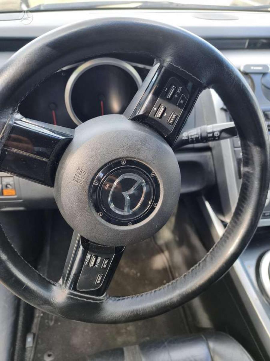 Black Mazda CX-7 2008 in Panevezys, with an engine capacity of 2.30 L and mileage of 210 thousand km for 950 €, photo 15 on AUTOMOTO.COM.LV