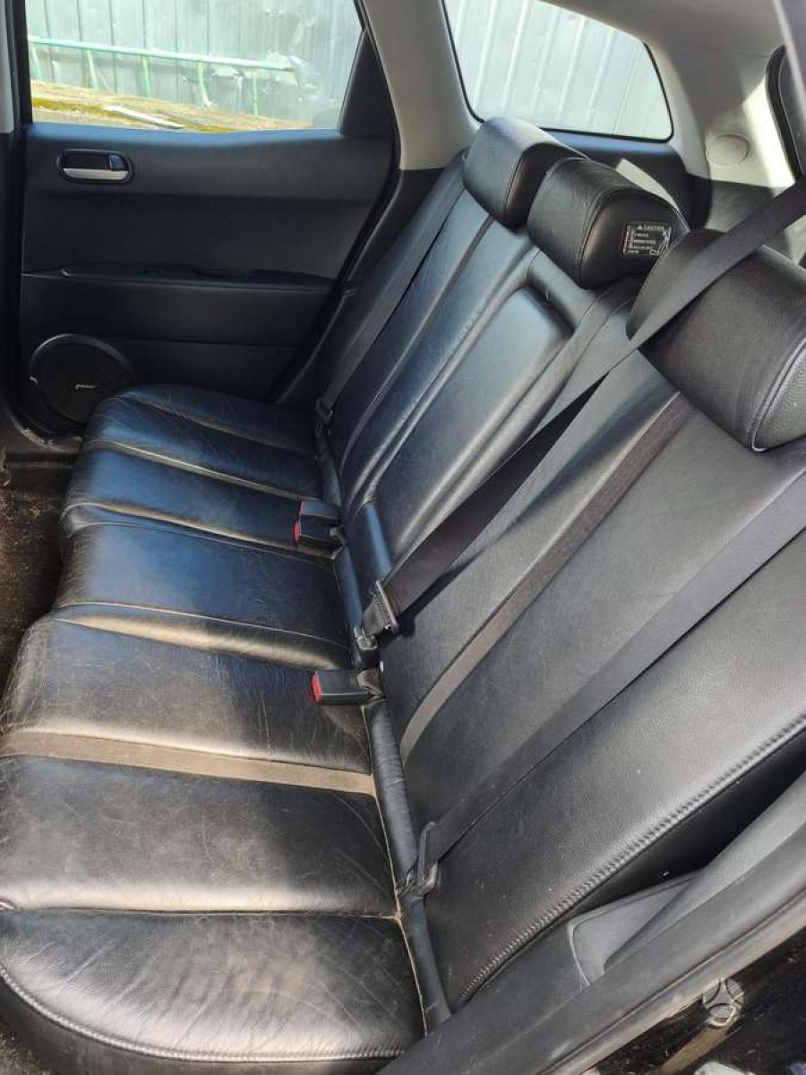Black Mazda CX-7 2008 in Panevezys, with an engine capacity of 2.30 L and mileage of 210 thousand km for 950 €, photo 16 on AUTOMOTO.COM.LV