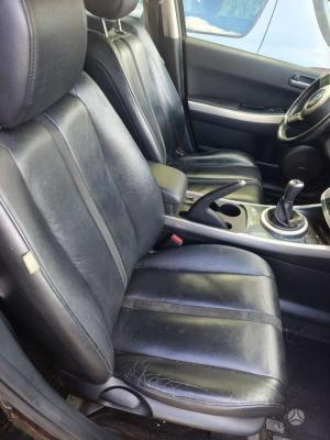 Black Mazda CX-7 2008 in Panevezys, with an engine capacity of 2.30 L and mileage of 210 thousand km for 950 €, photo 17 on AUTOMOTO.COM.LV
