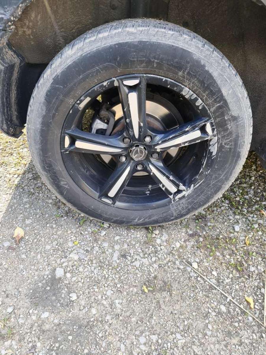 Black Mazda CX-7 2008 in Panevezys, with an engine capacity of 2.30 L and mileage of 210 thousand km for 950 €, photo 19 on AUTOMOTO.COM.LV