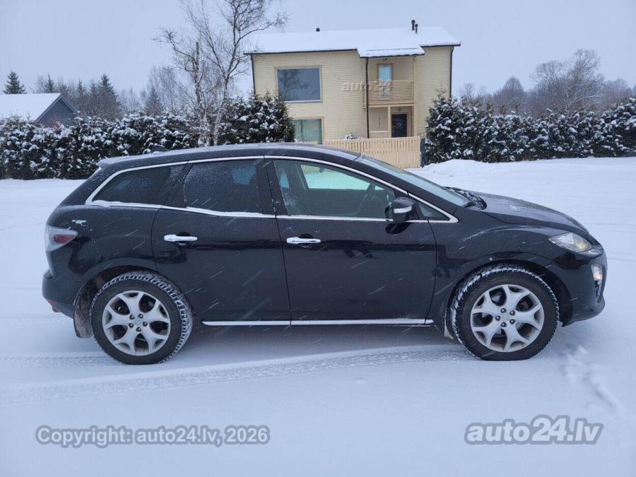Black Mazda CX-7 2010 in Tallinn, with an engine capacity of 2.20 L and mileage of 150 thousand km for 4900 €, photo 5 on AUTOMOTO.COM.LV