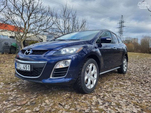 Blue Mazda CX-7 2010 in Vilnius, with an engine capacity of 2.20 L and mileage of 300 thousand km for 4900 €, photo 1 on AUTOMOTO.COM.LV