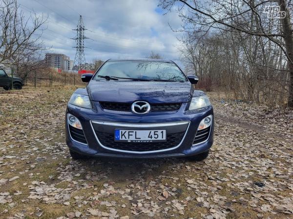 Blue Mazda CX-7 2010 in Vilnius, with an engine capacity of 2.20 L and mileage of 300 thousand km for 4900 €, photo 2 on AUTOMOTO.COM.LV