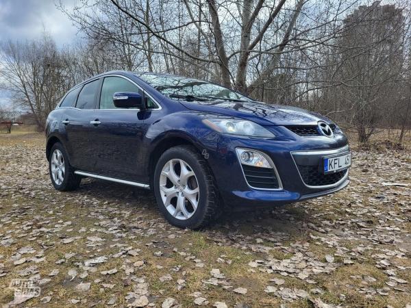 Blue Mazda CX-7 2010 in Vilnius, with an engine capacity of 2.20 L and mileage of 300 thousand km for 4900 €, photo 3 on AUTOMOTO.COM.LV