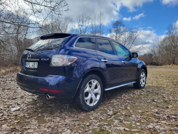 Blue Mazda CX-7 2010 in Vilnius, with an engine capacity of 2.20 L and mileage of 300 thousand km for 4900 €, photo 4 on AUTOMOTO.COM.LV