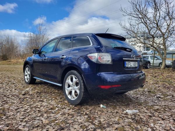 Blue Mazda CX-7 2010 in Vilnius, with an engine capacity of 2.20 L and mileage of 300 thousand km for 4900 €, photo 6 on AUTOMOTO.COM.LV