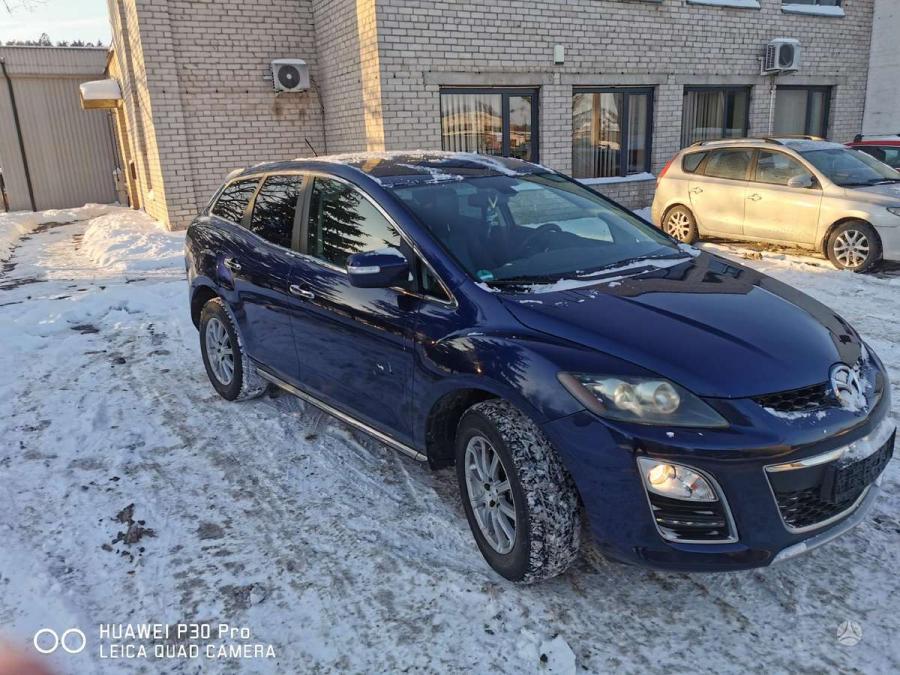 Blue Mazda CX-7 2011 in Prienai, with an engine capacity of 2.20 L and mileage of 203 thousand km for 4799 €, photo 3 on AUTOMOTO.COM.LV