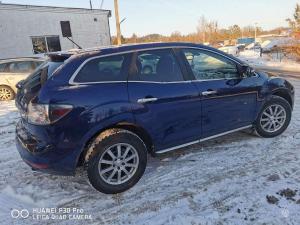 Blue Mazda CX-7 2011 in Prienai, with an engine capacity of 2.20 L and mileage of 203 thousand km for 4799 €, photo 13 on AUTOMOTO.COM.LV