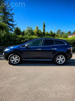 Blue Mazda CX-7 2011 in Cesis, with an engine capacity of 2.20 L and mileage of 235 thousand km for 5199 €, photo 3 on AUTOMOTO.COM.LV