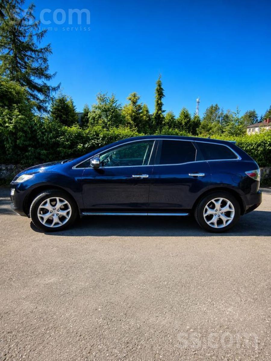 Blue Mazda CX-7 2011 in Cesis, with an engine capacity of 2.20 L and mileage of 235 thousand km for 5199 €, photo 3 on AUTOMOTO.COM.LV