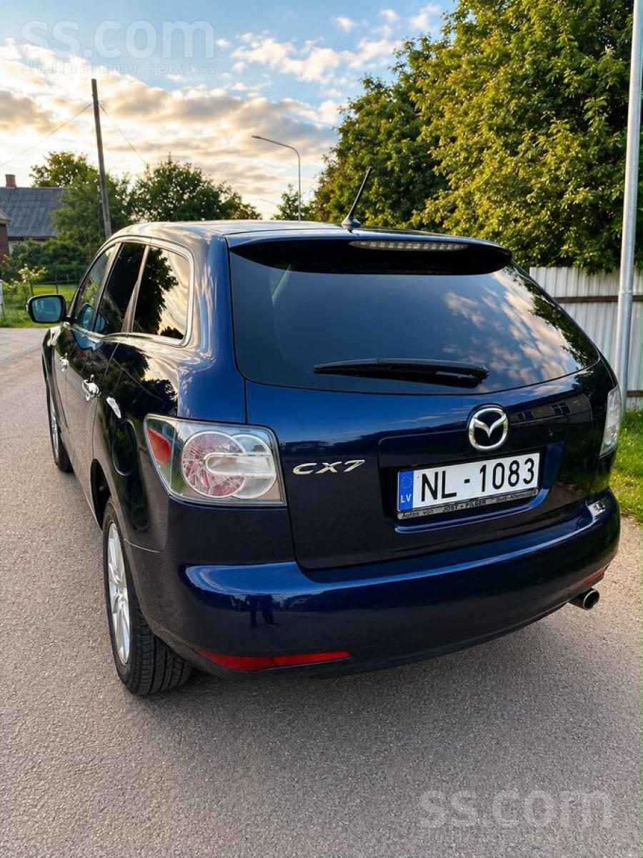 Blue Mazda CX-7 2011 in Rezekne, with an engine capacity of 2.20 L and mileage of 267 thousand km for 5299 €, photo 3 on AUTOMOTO.COM.LV