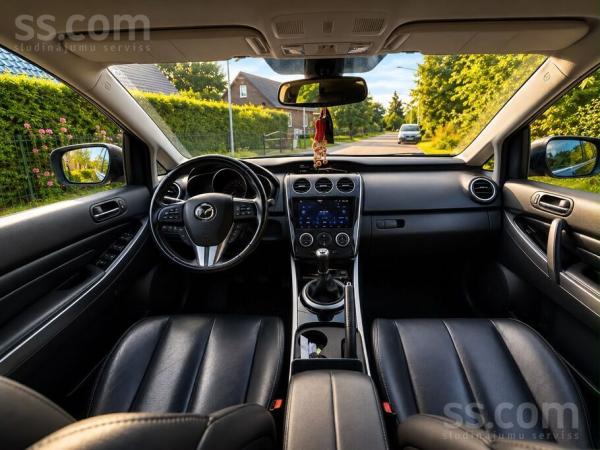 Zils Mazda CX-7 2011 Rēzekne, ar dzinēja tilpumu 2.20 L un nobraukumu 267 tūkst. km par 5299 €, foto 6 vietnē AUTOMOTO.COM.LV