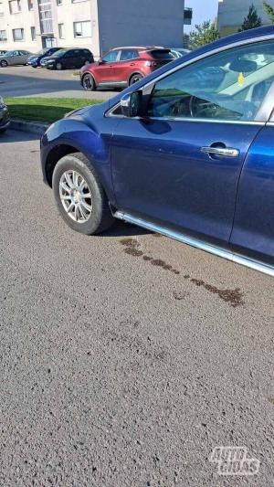 Blue Mazda CX-7 2011 in Marijampole, with an engine capacity of 2.20 L and mileage of 241 thousand km for 4200 €, photo 6 on AUTOMOTO.COM.LV