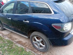 Blue Mazda CX-7 2011 in Trakai, with an engine capacity of 0.00 L and mileage of 250 thousand km for 1600 €, photo 4 on AUTOMOTO.COM.LV