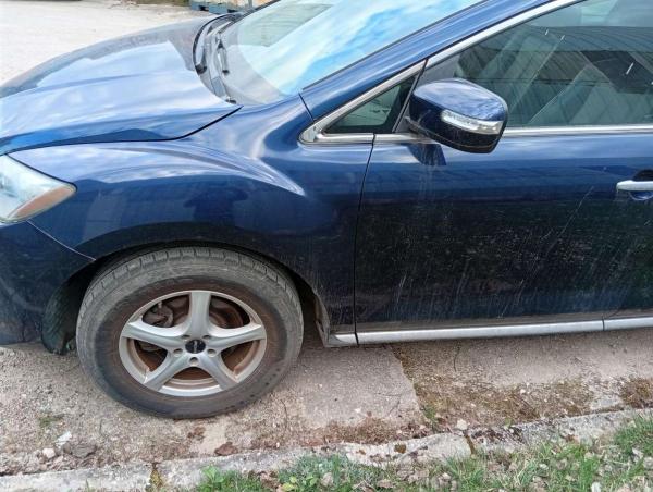 Blue Mazda CX-7 2011 in Trakai, with an engine capacity of 0.00 L and mileage of 250 thousand km for 1600 €, photo 6 on AUTOMOTO.COM.LV
