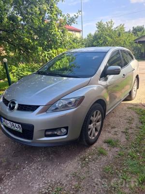 Brūns Mazda CX-7 2008 Balvi, ar dzinēja tilpumu 2.30 L un nobraukumu 223 tūkst. km par 2750 €, foto  vietnē AUTOMOTO.COM.LV