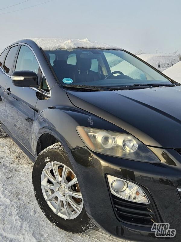 Brown Mazda CX-7 2009 in Kluonaliai, with an engine capacity of 2.20 L and mileage of 150 thousand km for 4880 €, photo 3 on AUTOMOTO.COM.LV