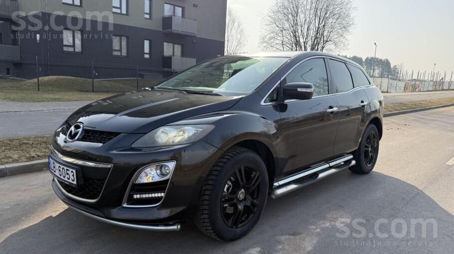 Brūns Mazda CX-7 2011 Rīga, ar dzinēja tilpumu 2.20 L un nobraukumu 309 tūkst. km par 2700 €, foto 1 vietnē AUTOMOTO.COM.LV