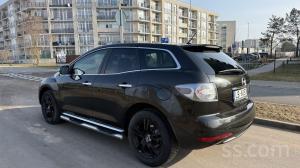 Brūns Mazda CX-7 2011 Rīga, ar dzinēja tilpumu 2.20 L un nobraukumu 309 tūkst. km par 2700 €, foto 3 vietnē AUTOMOTO.COM.LV