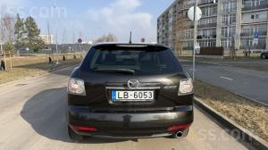 Brūns Mazda CX-7 2011 Rīga, ar dzinēja tilpumu 2.20 L un nobraukumu 309 tūkst. km par 2700 €, foto 4 vietnē AUTOMOTO.COM.LV