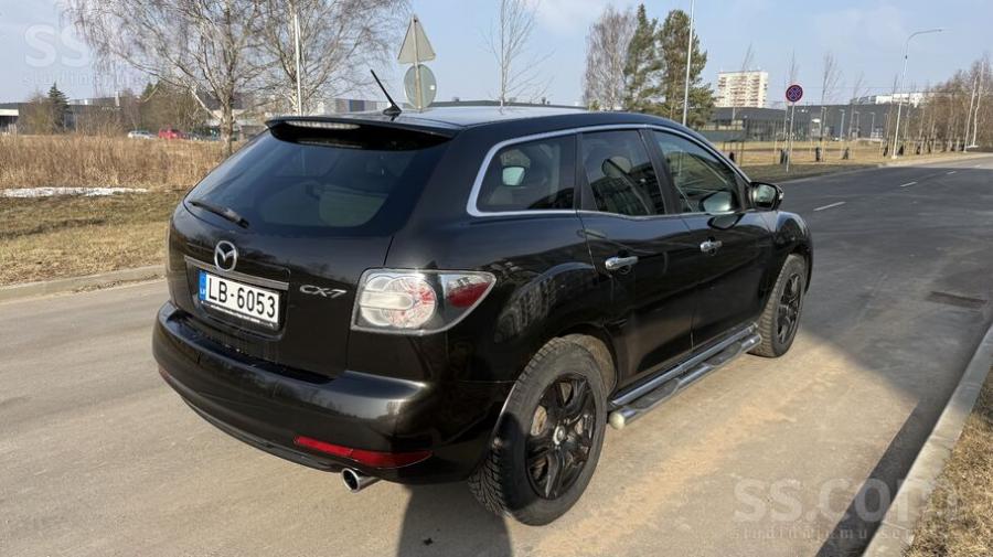 Brūns Mazda CX-7 2011 Rīga, ar dzinēja tilpumu 2.20 L un nobraukumu 309 tūkst. km par 2700 €, foto 5 vietnē AUTOMOTO.COM.LV
