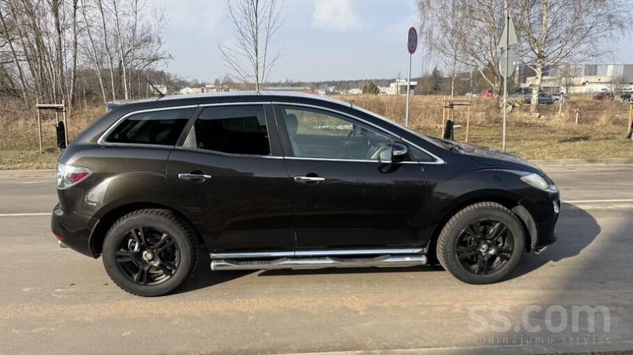 Brūns Mazda CX-7 2011 Rīga, ar dzinēja tilpumu 2.20 L un nobraukumu 309 tūkst. km par 2700 €, foto 6 vietnē AUTOMOTO.COM.LV