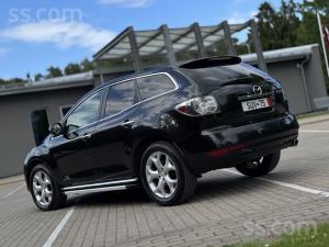 Brown Mazda CX-7 2011 in Jurmala, with an engine capacity of 2.20 L and mileage of 189 thousand km for 4790 €, photo 5 on AUTOMOTO.COM.LV