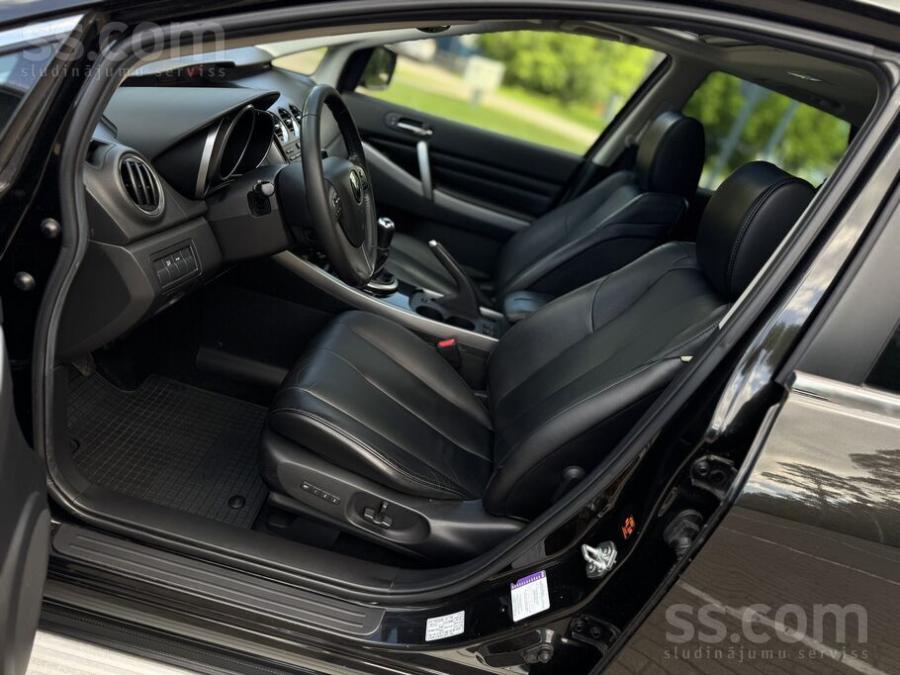 Brown Mazda CX-7 2011 in Jurmala, with an engine capacity of 2.20 L and mileage of 189 thousand km for 4790 €, photo 8 on AUTOMOTO.COM.LV