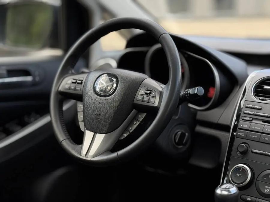 Brown Mazda CX-7 2011 in Jurmala, with an engine capacity of 2.20 L and mileage of 189 thousand km for 2790 €, photo 15 on AUTOMOTO.COM.LV