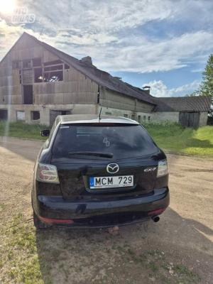 Mazda CX-7 2010 in Kaunas, with an engine capacity of 2.20 L and mileage of 306 thousand km for 5350 €, photo 5 on AUTOMOTO.COM.LV