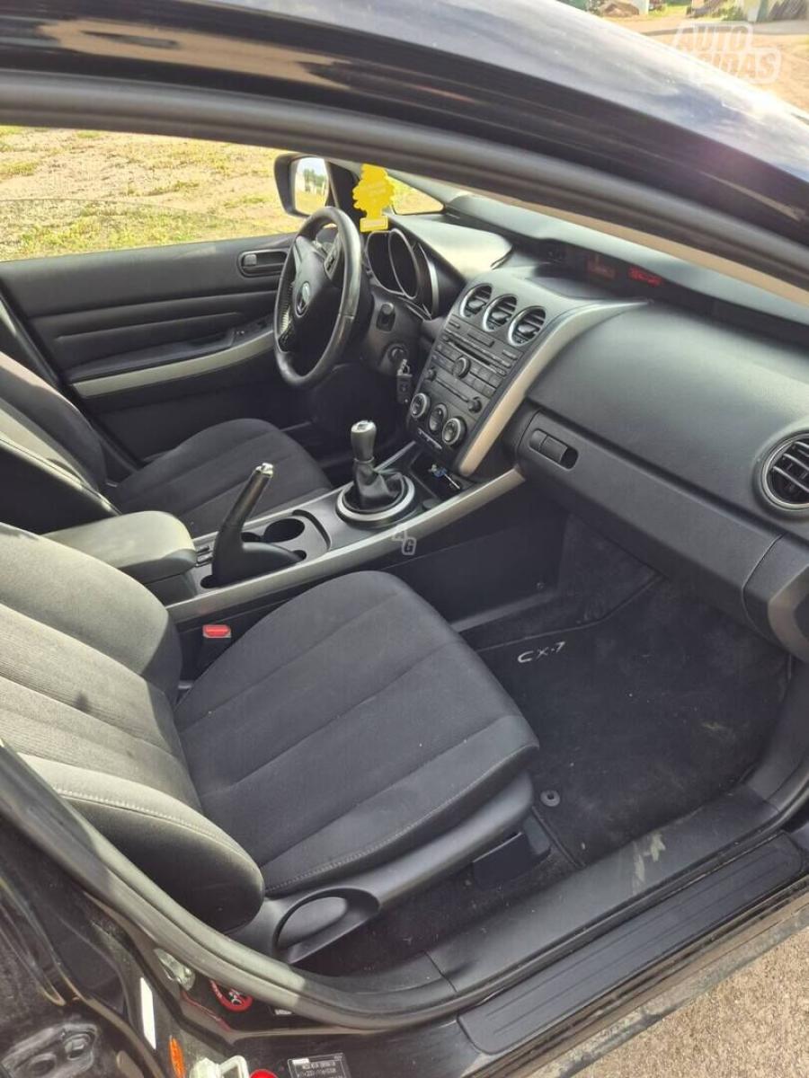 Mazda CX-7 2010 in Kaunas, with an engine capacity of 2.20 L and mileage of 306 thousand km for 5350 €, photo 10 on AUTOMOTO.COM.LV