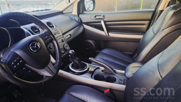 Mazda CX-7 2011 in Riga, with an engine capacity of 2.20 L and mileage of 239 thousand km for 4900 €, photo 5 on AUTOMOTO.COM.LV