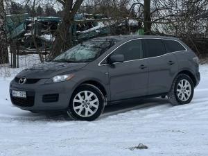 Grey Mazda CX-7 2008 in Riga, with an engine capacity of 2.30 L and mileage of 253 thousand km for 2600 €, photo 4 on AUTOMOTO.COM.LV