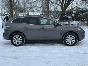 Grey Mazda CX-7 2008 in Riga, with an engine capacity of 2.30 L and mileage of 253 thousand km for 2600 €, photo 13 on AUTOMOTO.COM.LV
