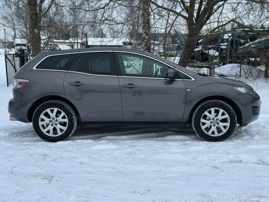 Grey Mazda CX-7 2008 in Riga, with an engine capacity of 2.30 L and mileage of 253 thousand km for 2600 €, photo 13 on AUTOMOTO.COM.LV