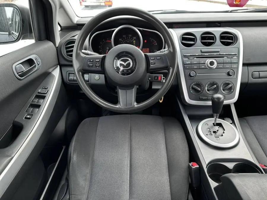 Grey Mazda CX-7 2008 in Riga, with an engine capacity of 2.30 L and mileage of 253 thousand km for 2600 €, photo 24 on AUTOMOTO.COM.LV