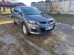 Grey Mazda CX-7 2009 in Riga, with an engine capacity of 2.20 L and mileage of 0 thousand km for 4700 €, photo 1 on AUTOMOTO.COM.LV