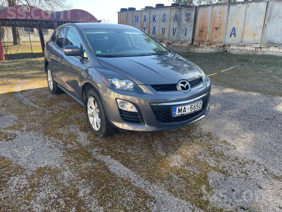 Grey Mazda CX-7 2009 in Riga, with an engine capacity of 2.20 L and mileage of 0 thousand km for 4700 €, photo 1 on AUTOMOTO.COM.LV