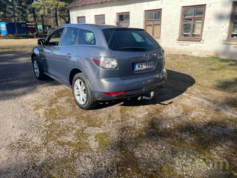 Grey Mazda CX-7 2009 in Riga, with an engine capacity of 2.20 L and mileage of 0 thousand km for 4700 €, photo 6 on AUTOMOTO.COM.LV