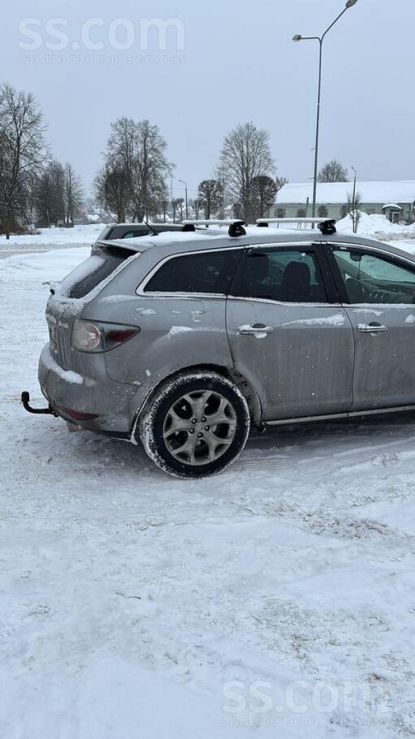 Pelēks Mazda CX-7 2009 Daugavpils, ar dzinēja tilpumu 2.20 L un nobraukumu 280 tūkst. km par 3850 €, foto 2 vietnē AUTOMOTO.COM.LV