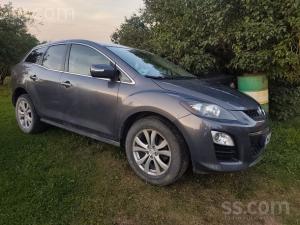 Grey Mazda CX-7 2009 in Riga, with an engine capacity of 2.20 L and mileage of 212 thousand km for 3900 €, photo 3 on AUTOMOTO.COM.LV