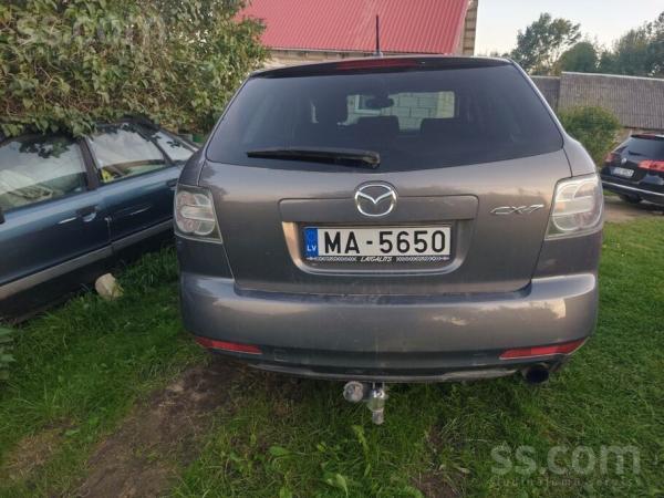 Серый Мазда СХ-7 2009 в Рига, объемом двигателя 2.20 л и пробегом 212 тыс. км за 3900 €, фото 3 на AUTOMOTO.COM.LV